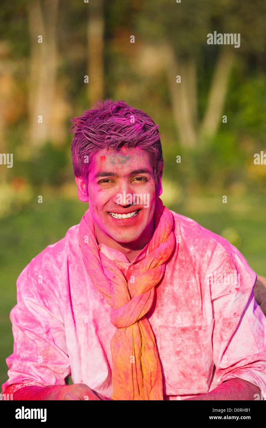 Portrait of a man celebrating Holi Stock Photo - Alamy