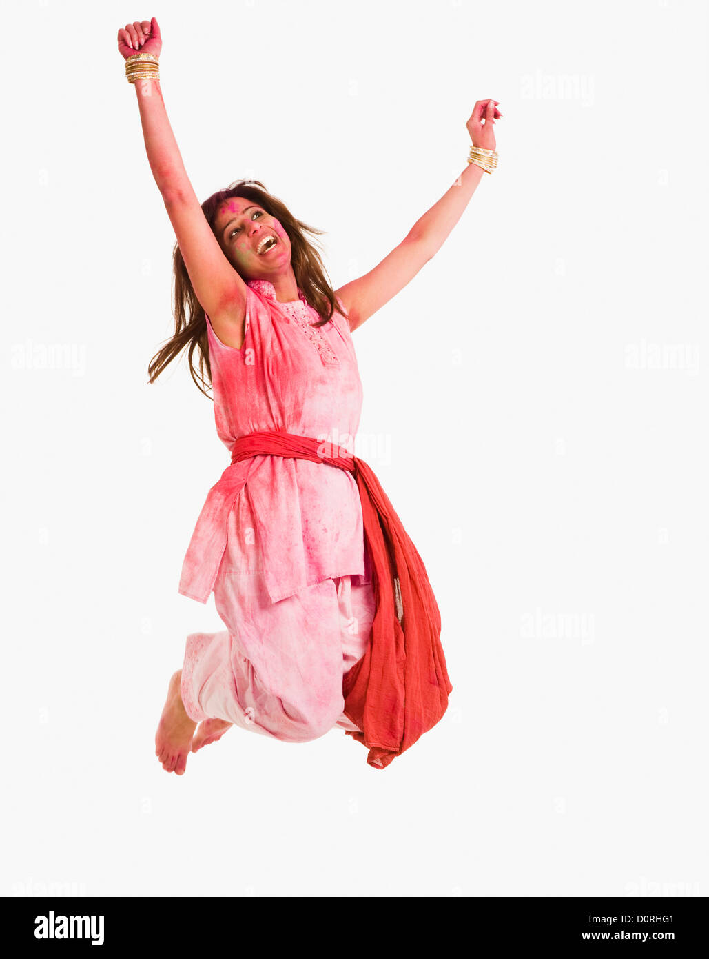 Woman celebrating Holi Stock Photo - Alamy