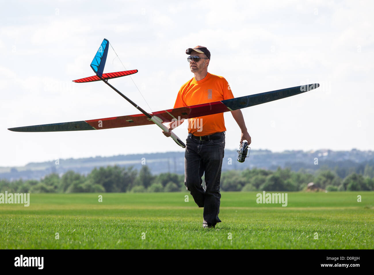Man holds the RC glider Stock Photo - Alamy
