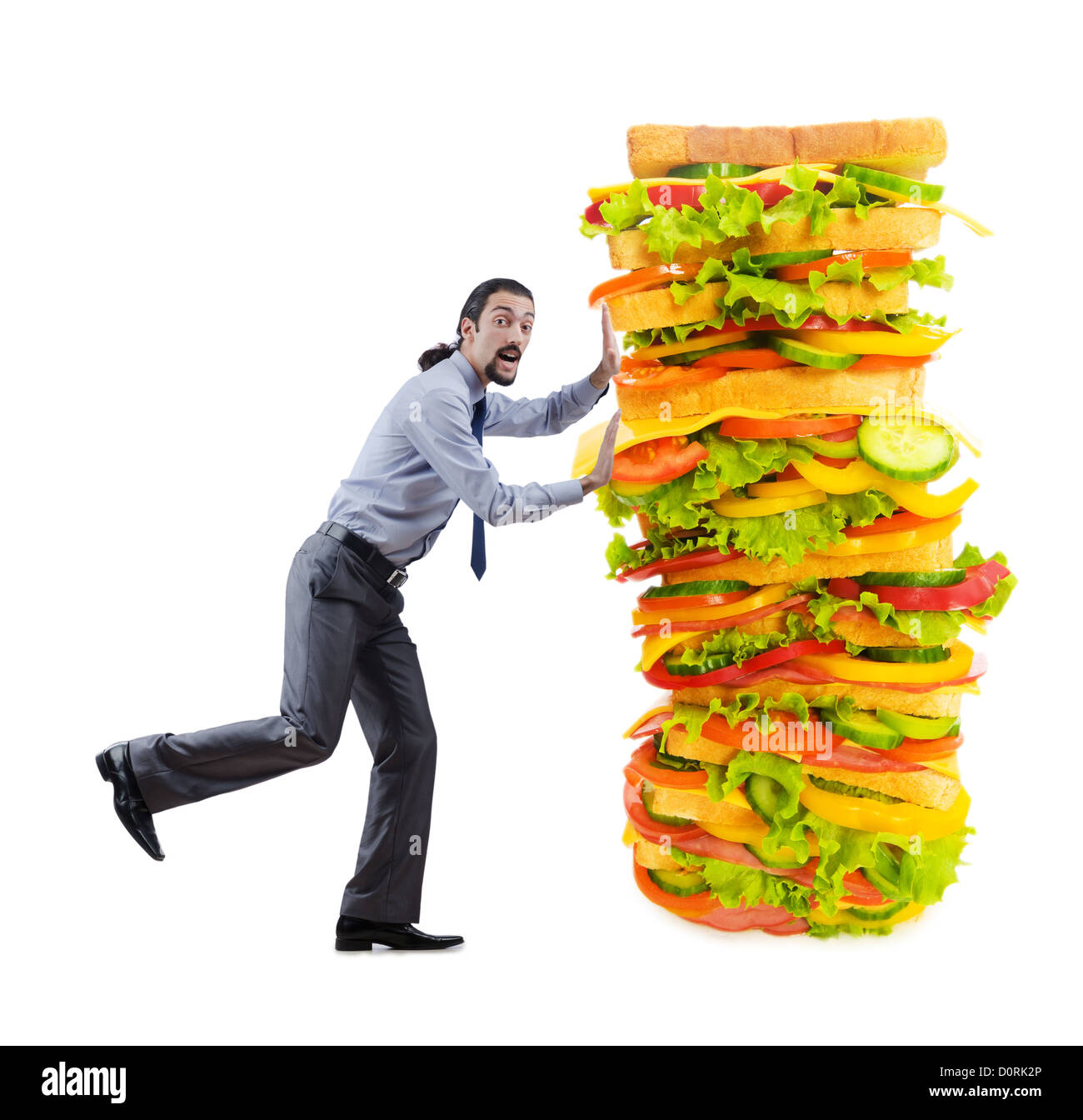 Man and giant sandwich on white Stock Photo - Alamy