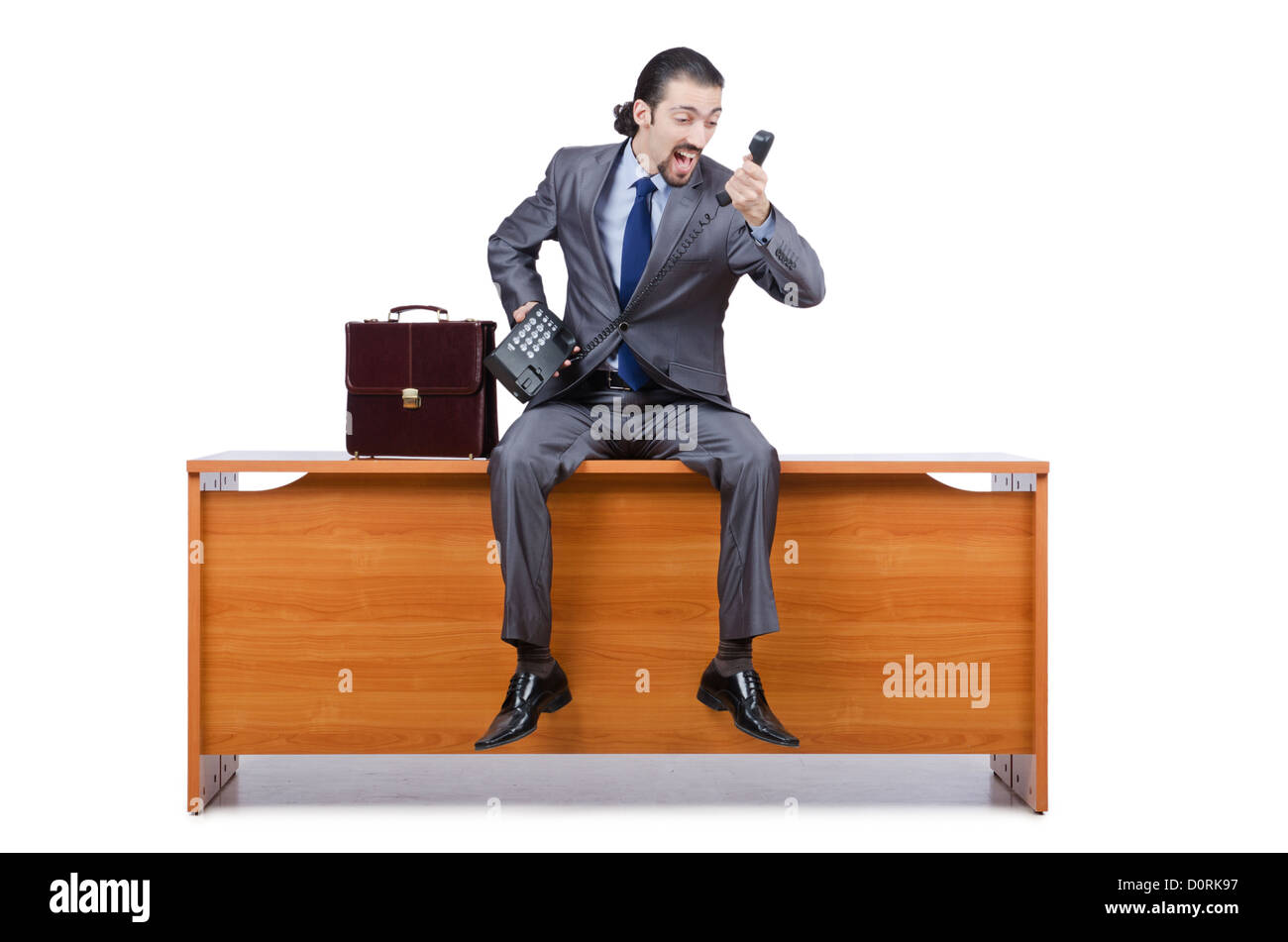Angry businessman telephone Cut Out Stock Images & Pictures - Alamy