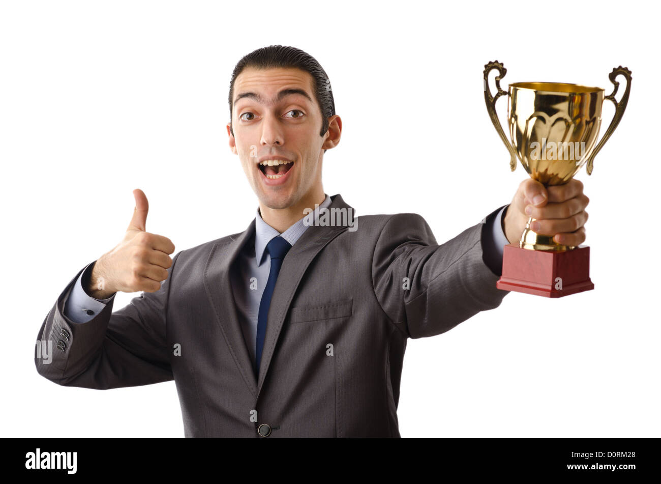 Golden trophy is being awarded to the winner hi-res stock photography ...