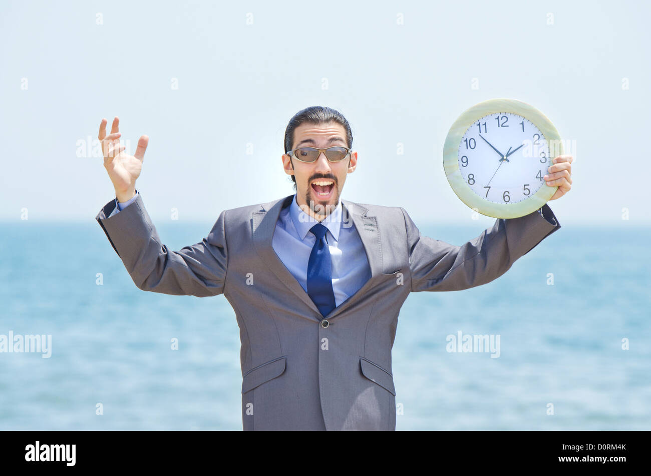 Man clock on seaside hi-res stock photography and images - Alamy