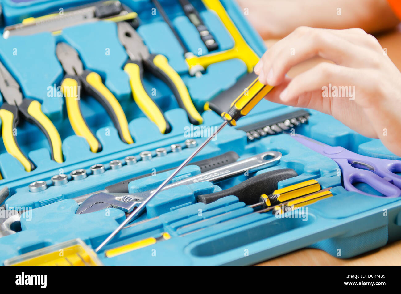 Repairman with his toolkit Stock Photo - Alamy