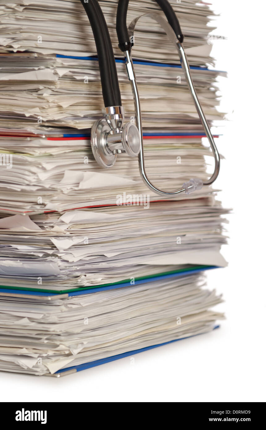 Stack of papers with stethoscope Stock Photo - Alamy