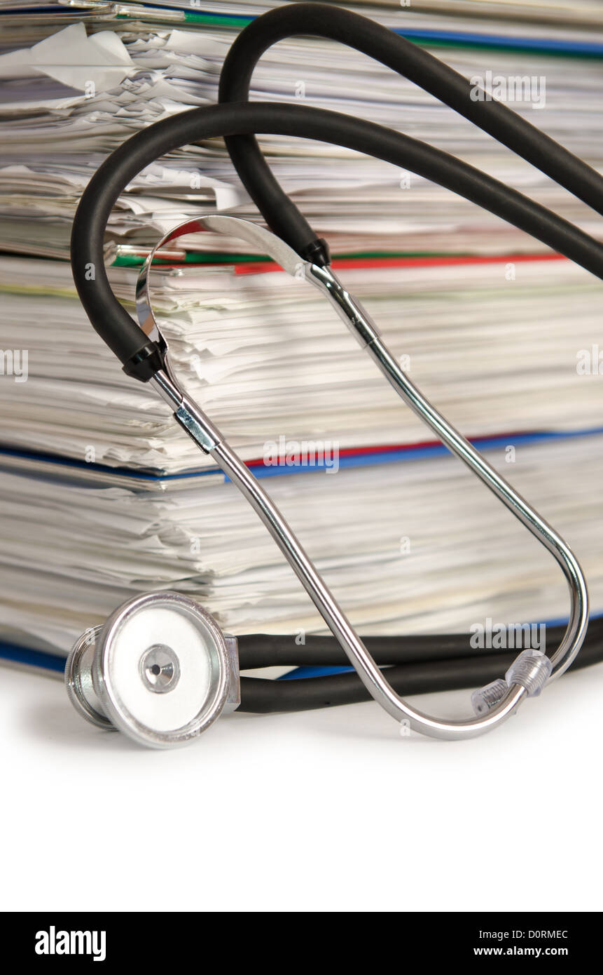 Stack of papers with stethoscope Stock Photo - Alamy