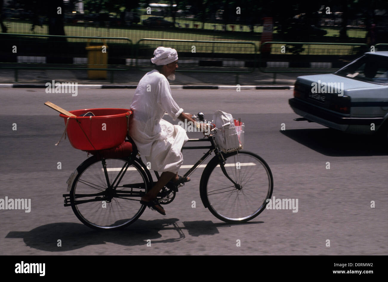 Singapore, vendor on cycle, a rare traditional sight in modern day ...