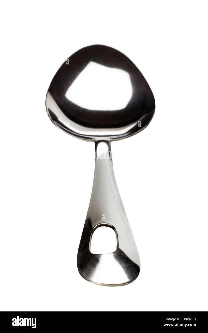 Close-up of a service spoon Stock Photo - Alamy