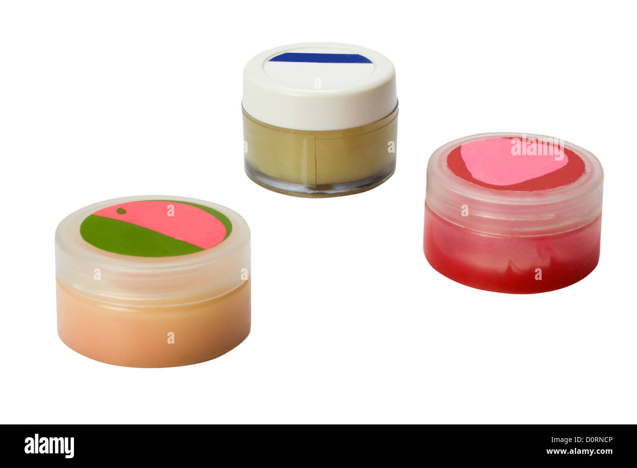 Close-up of three moisturizer containers Stock Photo - Alamy