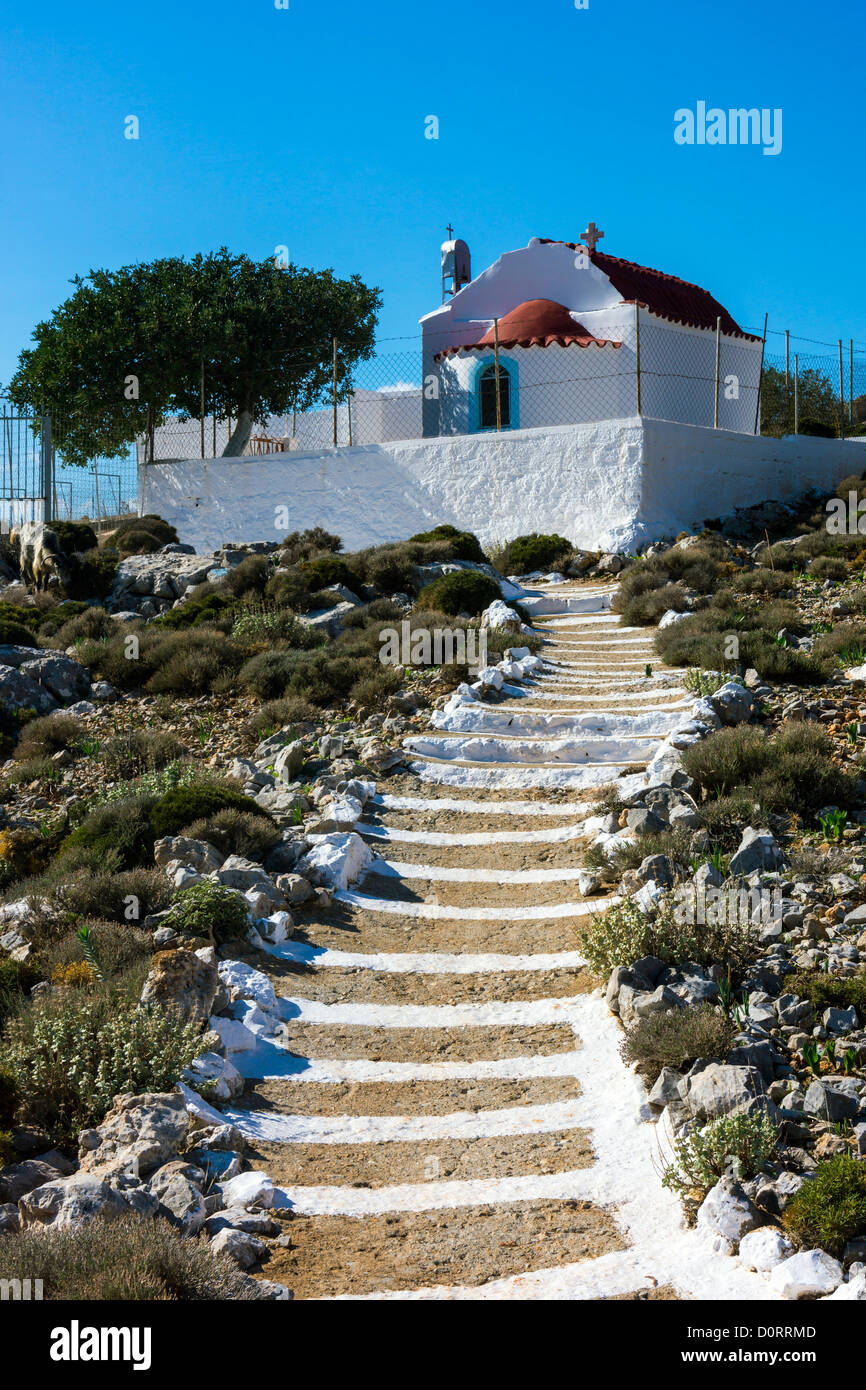 Small Greek chapel with white steps and blue sky Stock Photo - Alamy