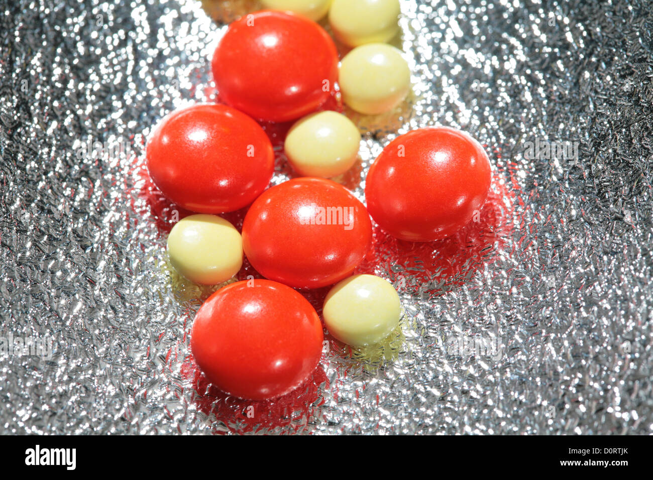 red and yellow tablet Stock Photo - Alamy