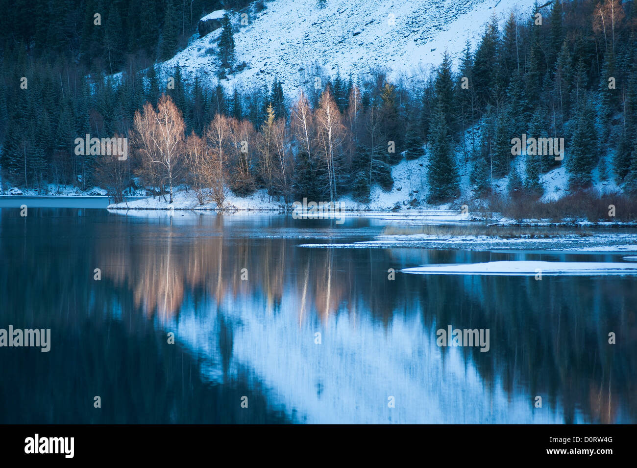 Beautiful winter lake in snow mountains with wonderful reflection Stock ...