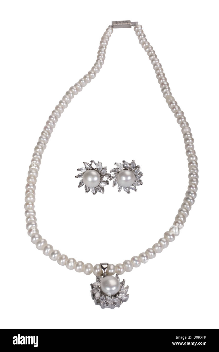 Close-up of pearl earrings and a pearl necklace Stock Photo - Alamy