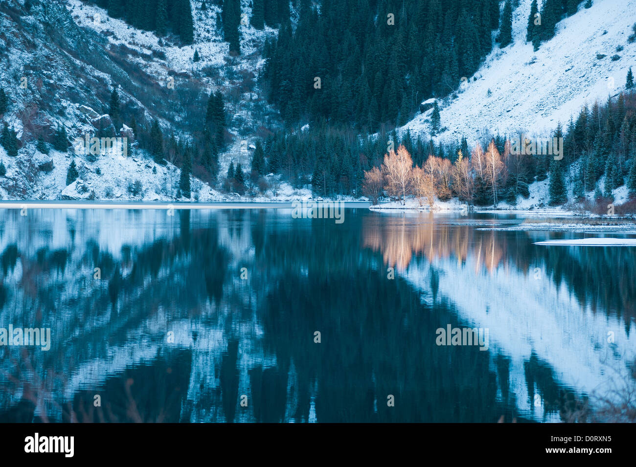 Beautiful winter lake in snow mountains with wonderful reflection Stock ...