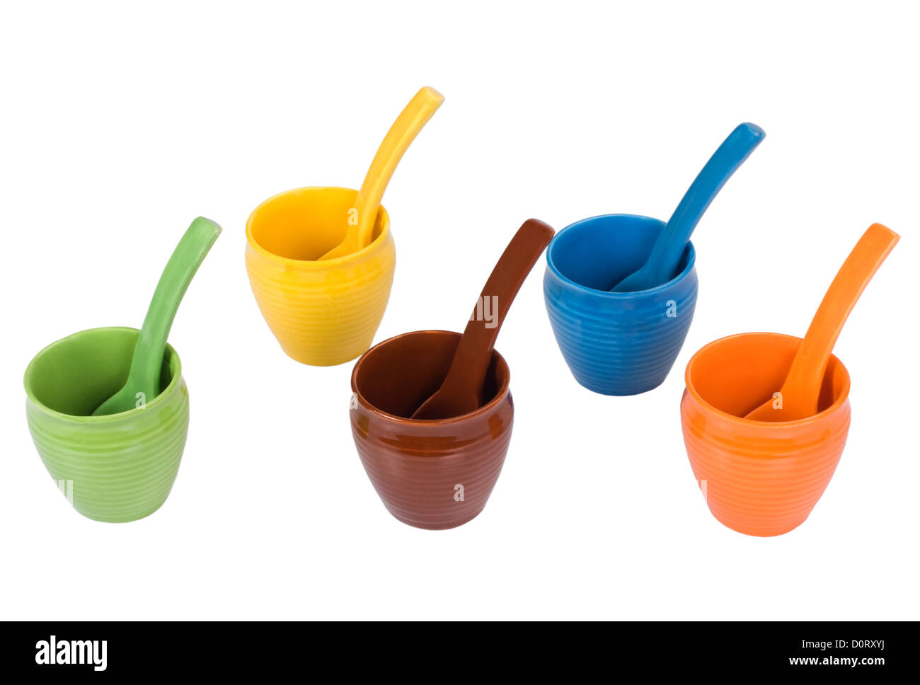Assorted ceramic containers and soup spoons Stock Photo - Alamy