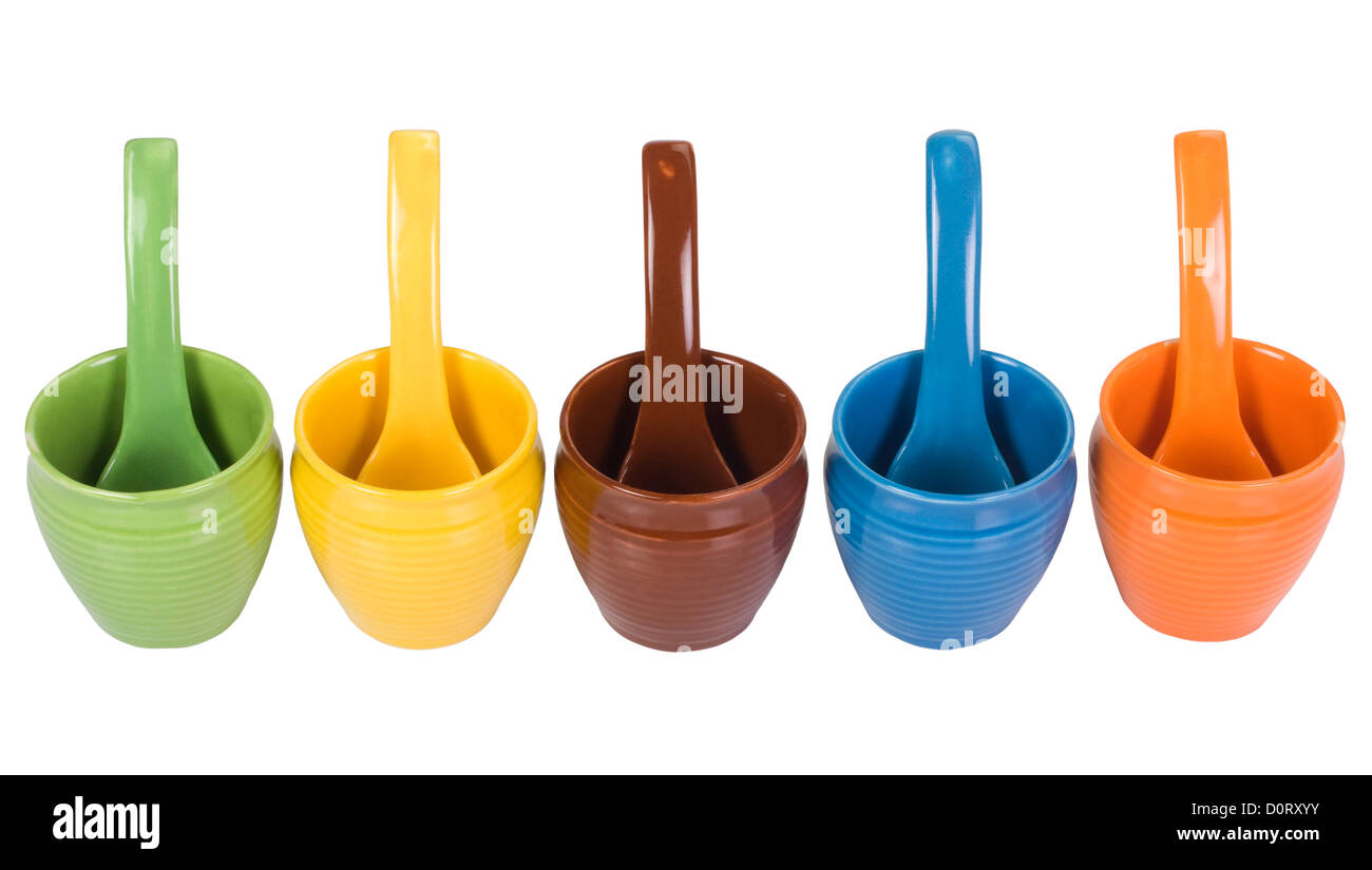 Assorted ceramic containers and soup spoons Stock Photo - Alamy