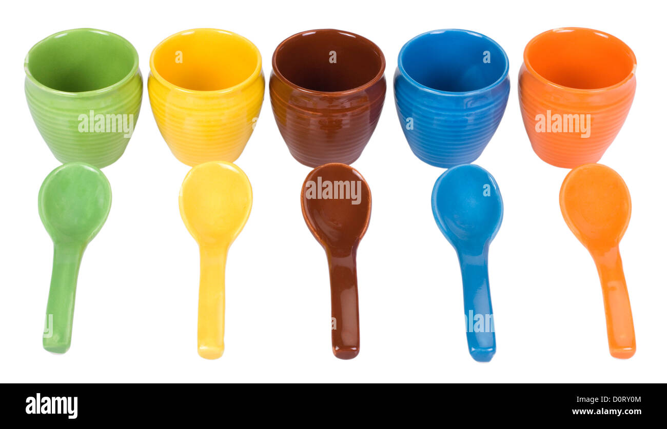 Assorted ceramic containers and soup spoons Stock Photo - Alamy