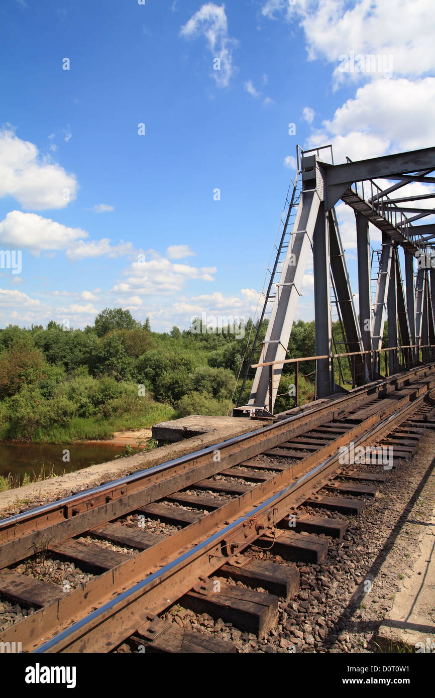 old railway bridge through small river Stock Photo - Alamy