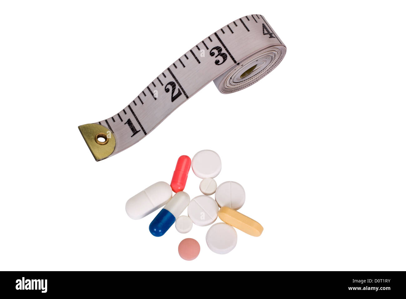Pills with a tape measure Stock Photo - Alamy
