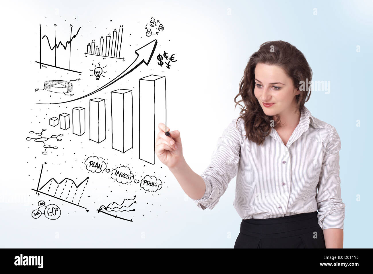 Young business woman drawing diagrams Stock Photo - Alamy