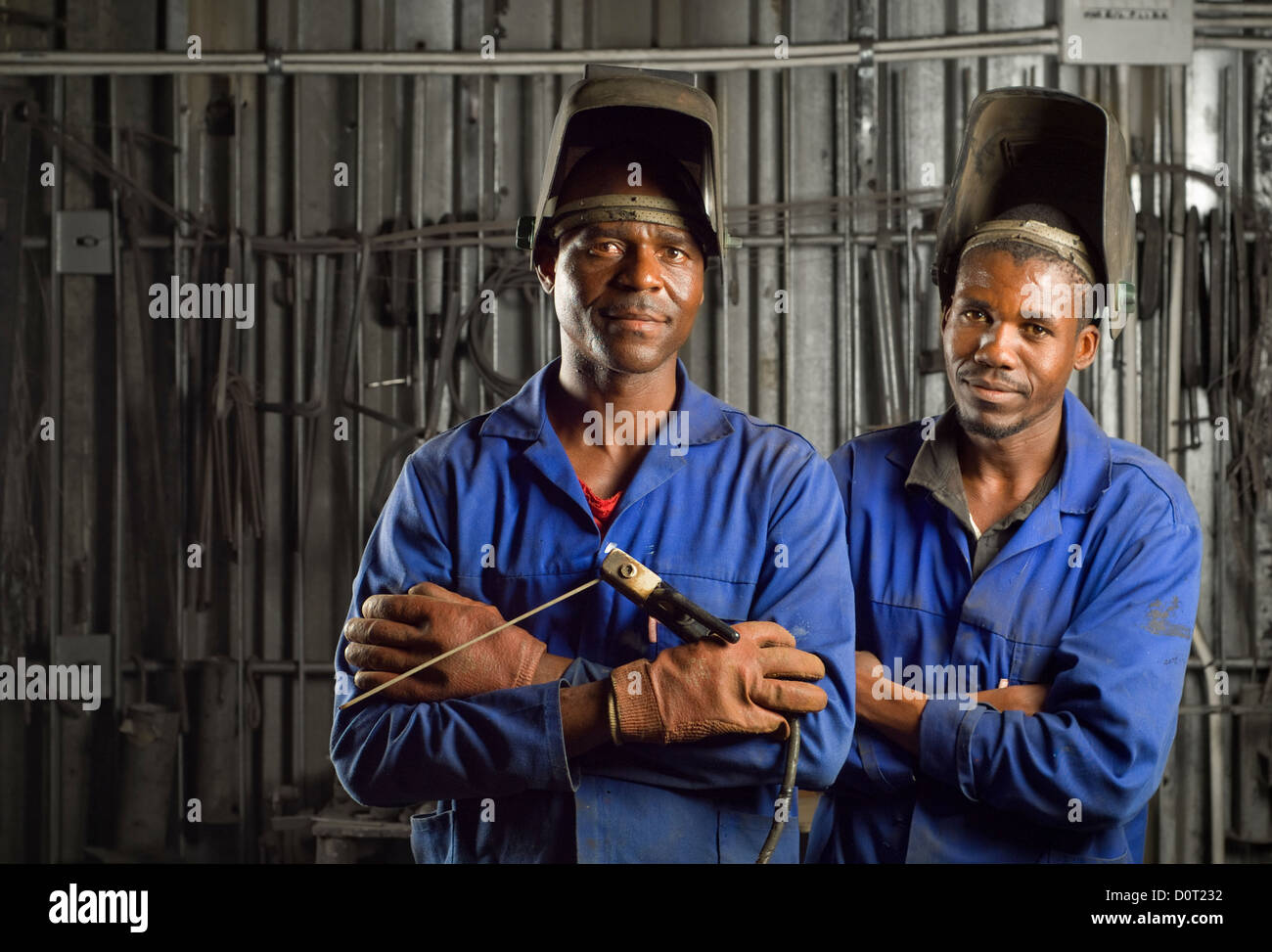 South African or American black workers or welders in factory Stock ...
