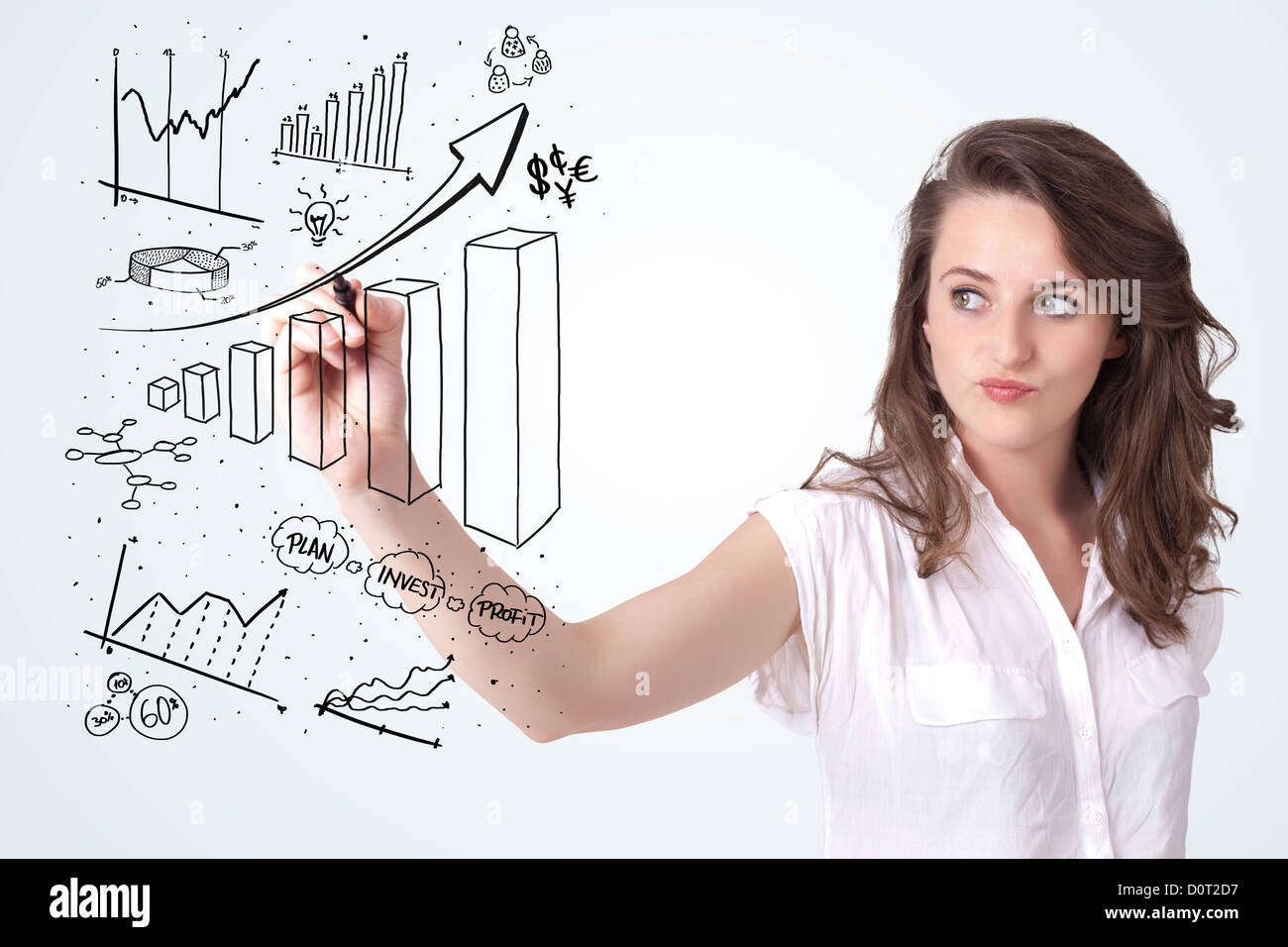 Young business woman drawing diagrams Stock Photo - Alamy