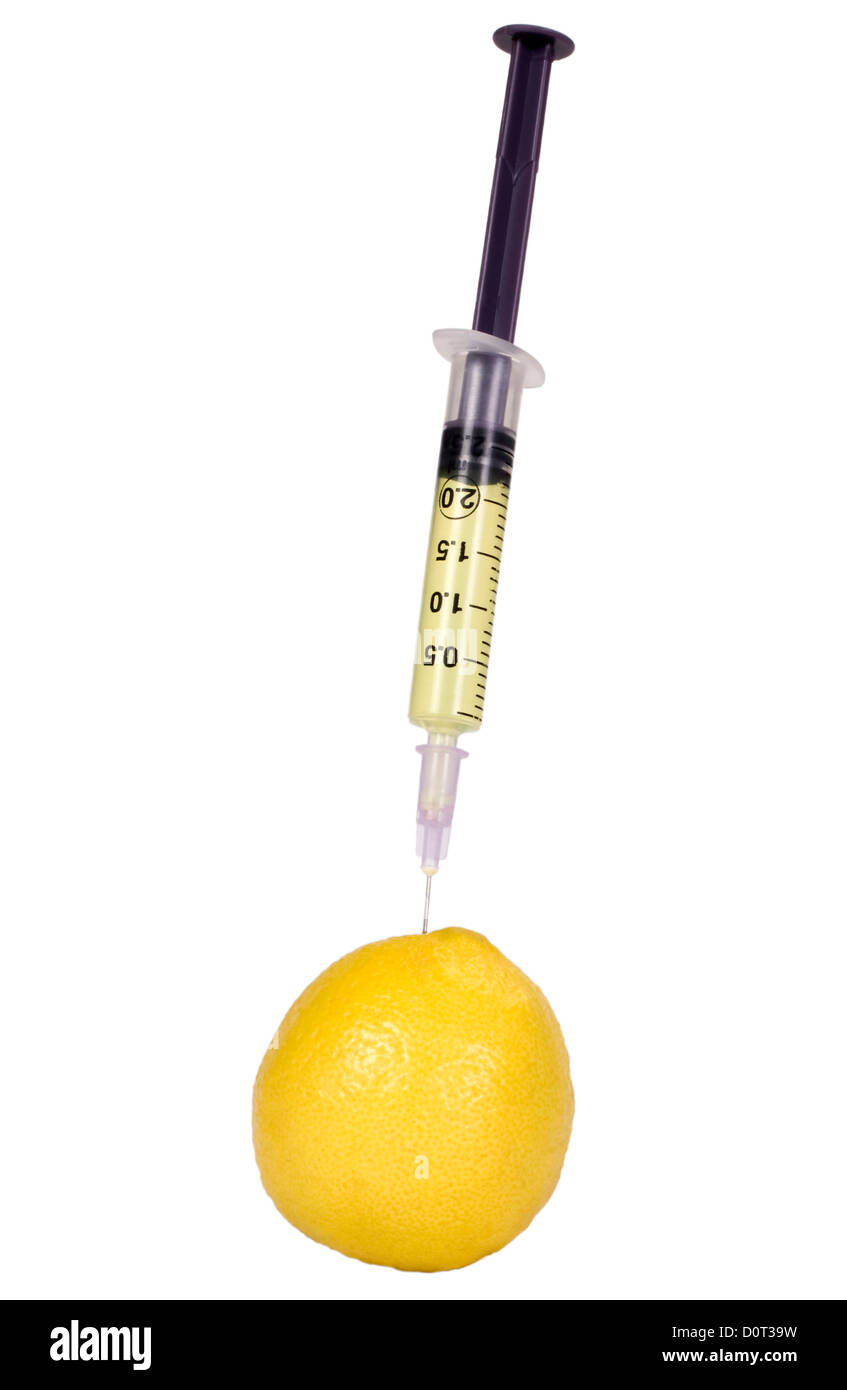Lemon being injected with a syringe Stock Photo - Alamy