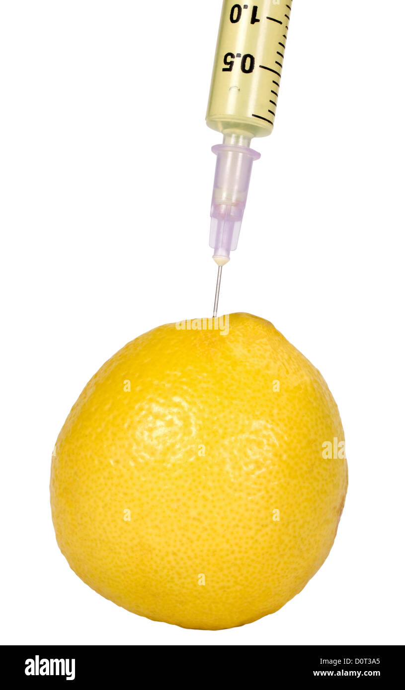 Lemon being injected with a syringe Stock Photo - Alamy