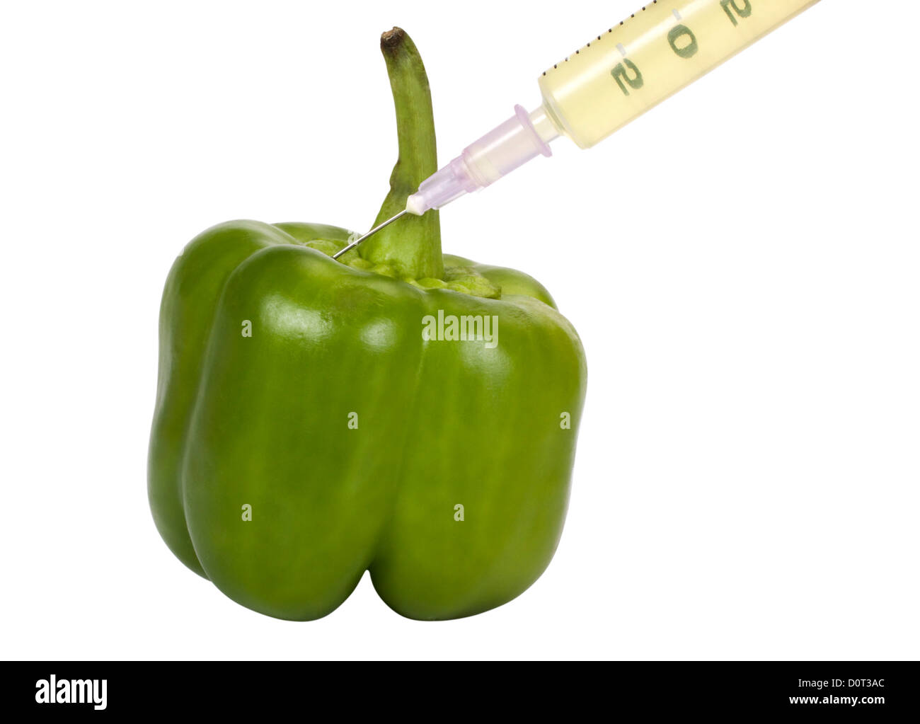 Green bell pepper being injected with a syringe Stock Photo - Alamy
