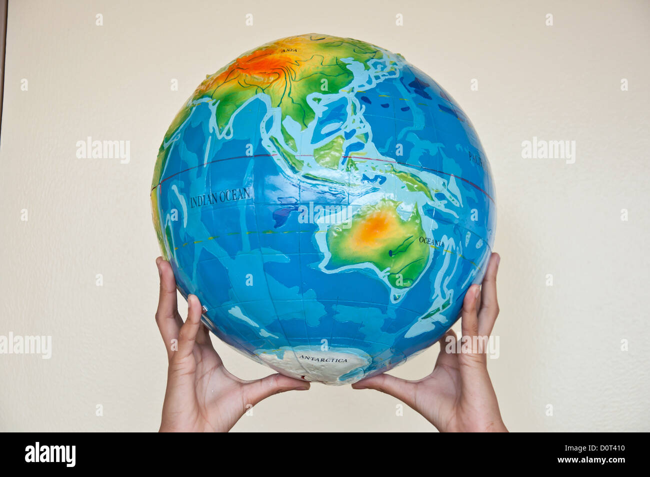 earth on children hand Stock Photo - Alamy