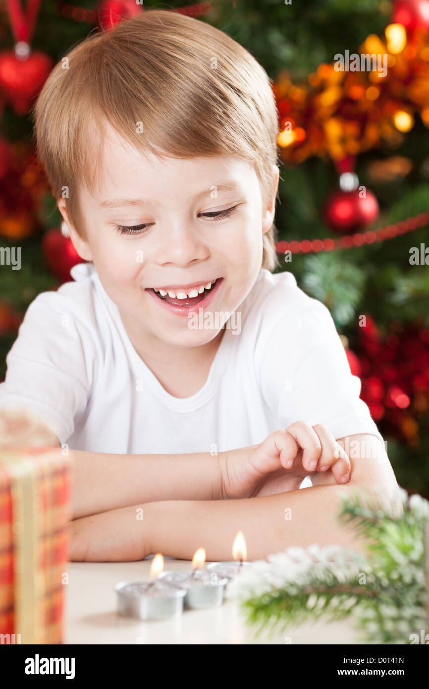 Happy kid in Christmas Stock Photo - Alamy