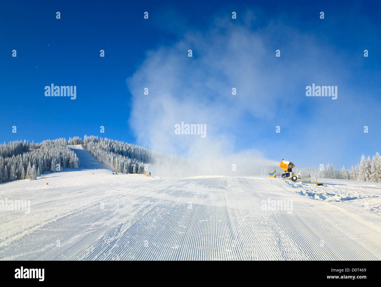 Snowmaking on a mountain ski resort Stock Photo - Alamy