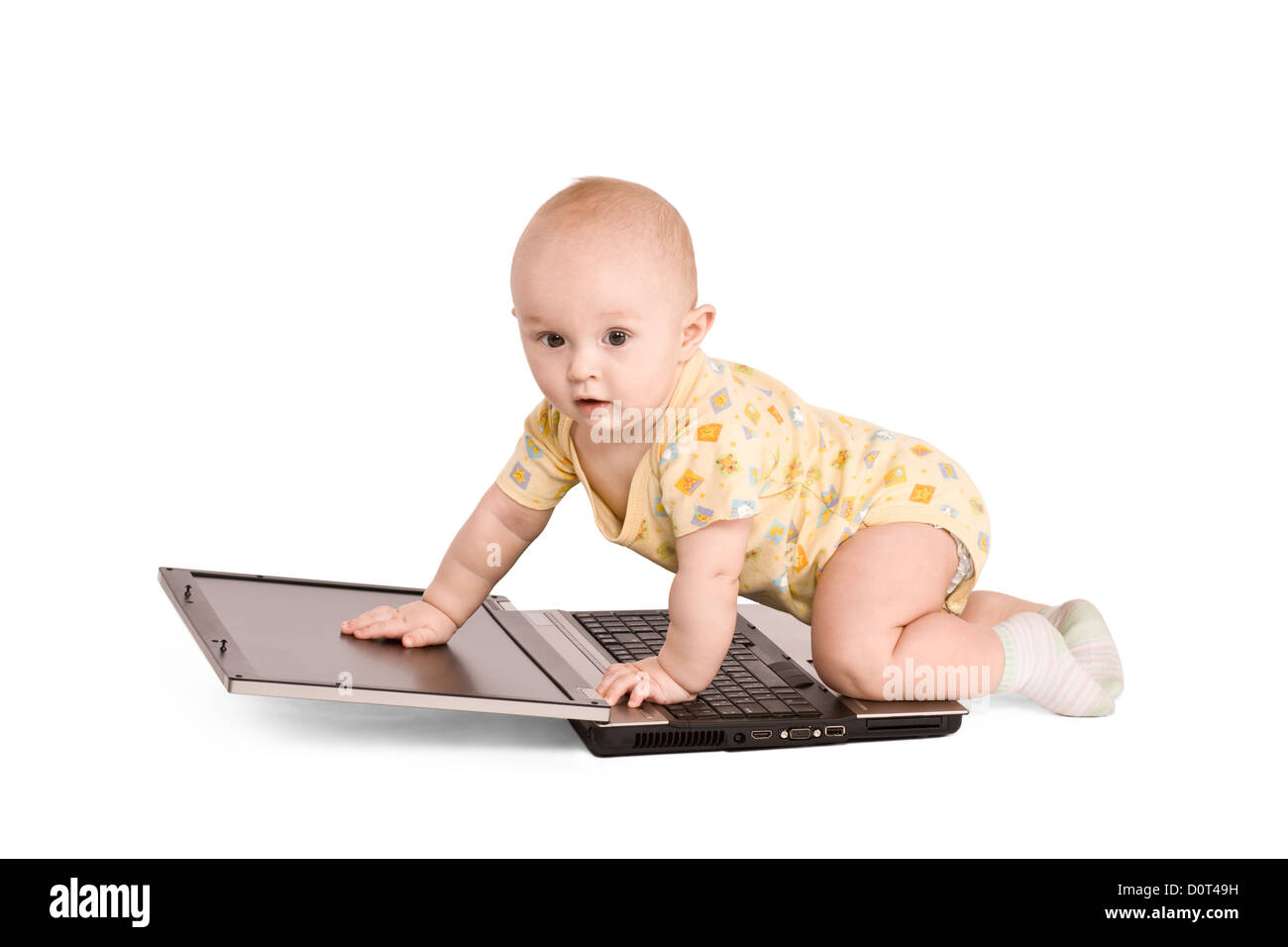 Сhild over laptop Stock Photo - Alamy