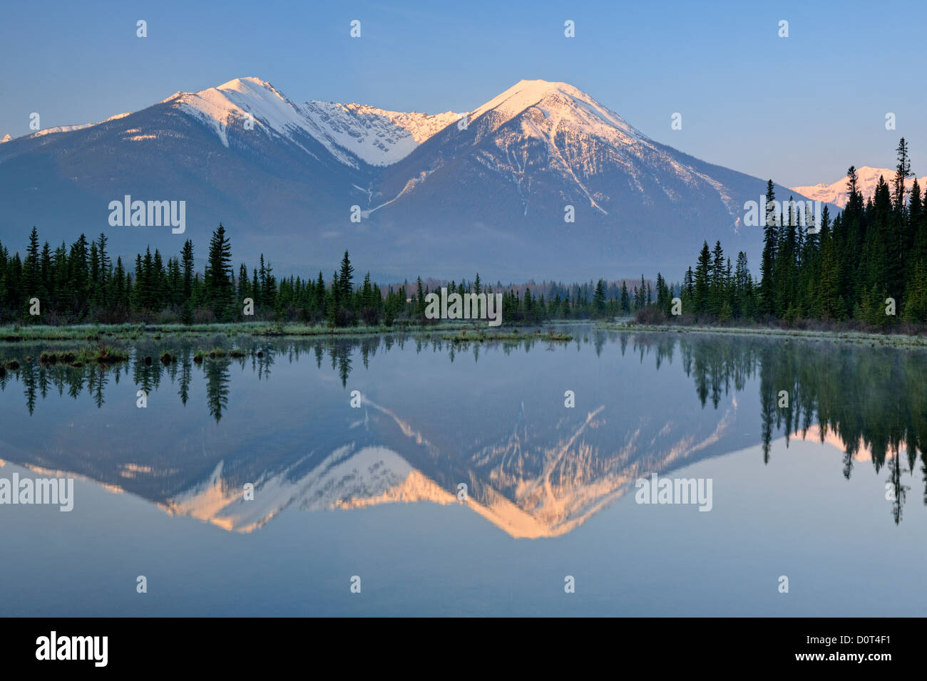 Sundance Range reflected in Third Vermilion Lake, Banff National Park ...