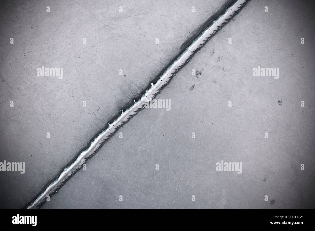 welding seam onto aluminium sheet metal part, diagonal separation Stock ...