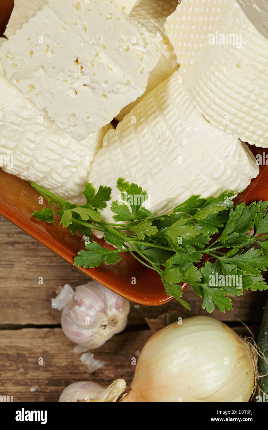 Cheese and vegetables above view Stock Photo - Alamy