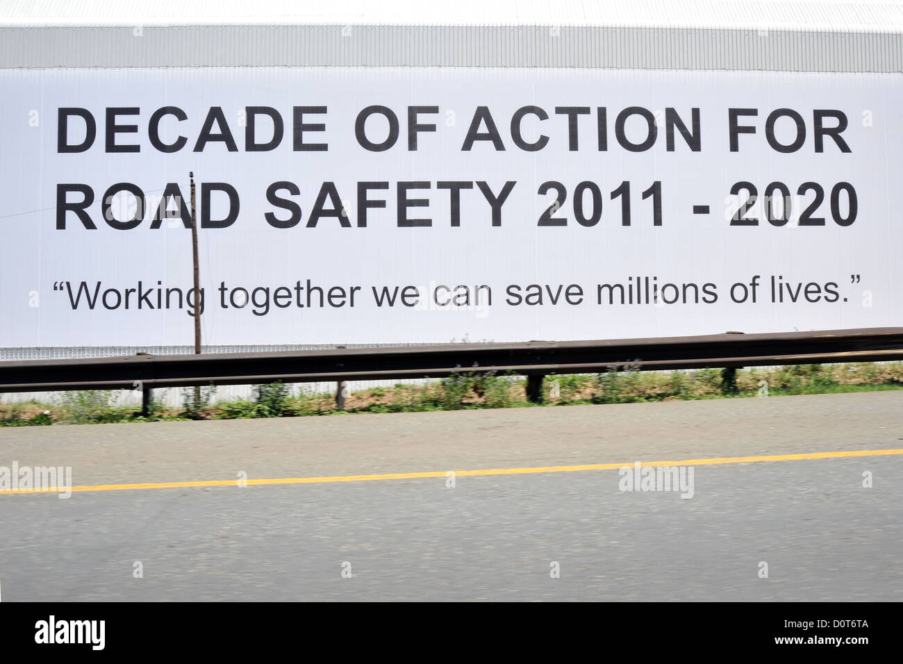 A government road safety advert on the side of a building in ...