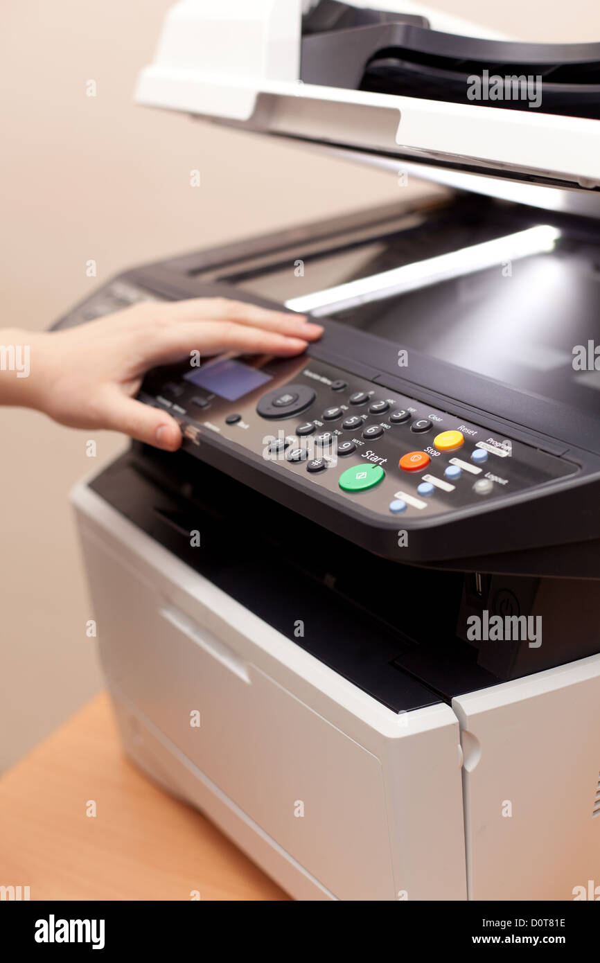 Woman's hand with open copier Stock Photo - Alamy