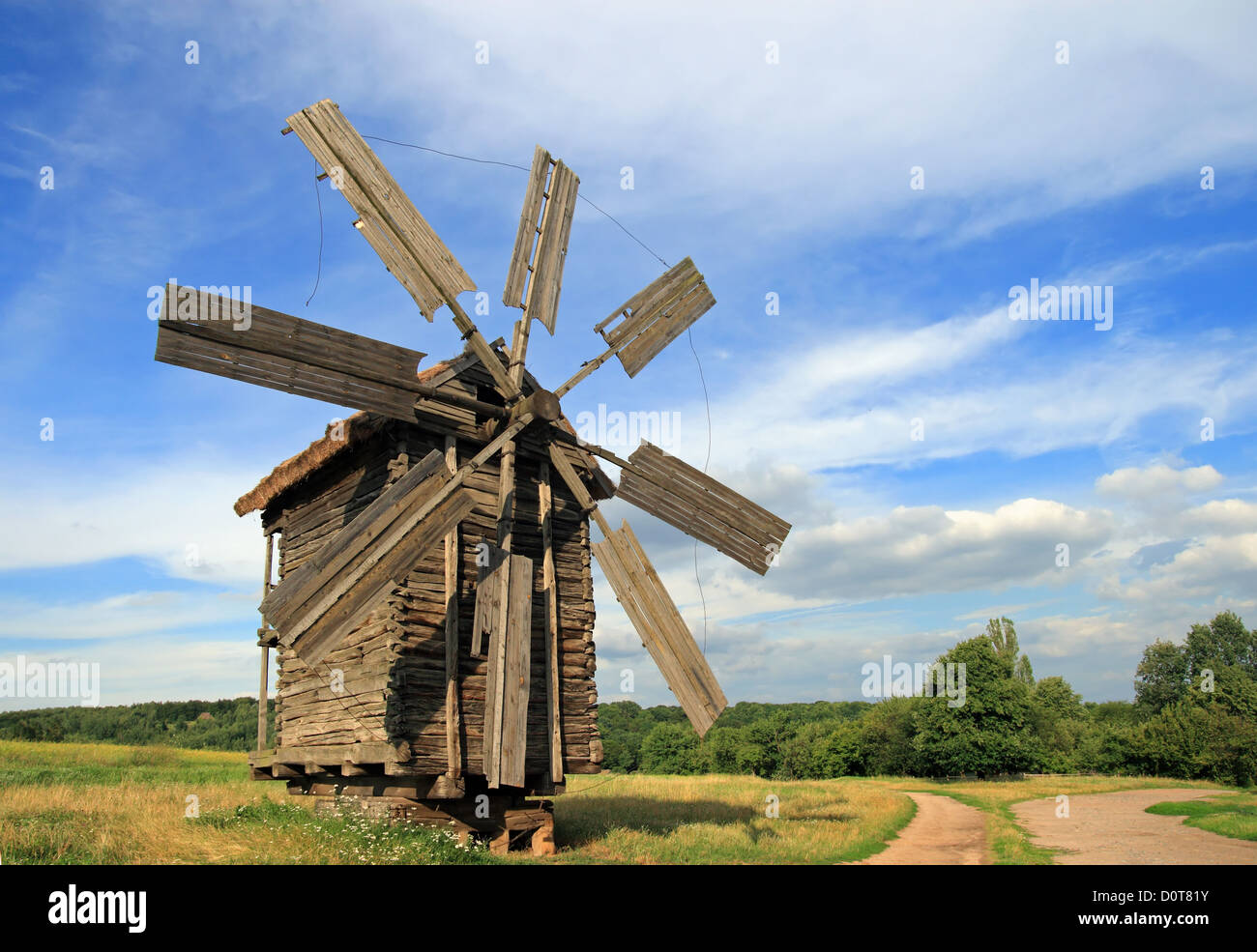 windmill near road Stock Photo - Alamy