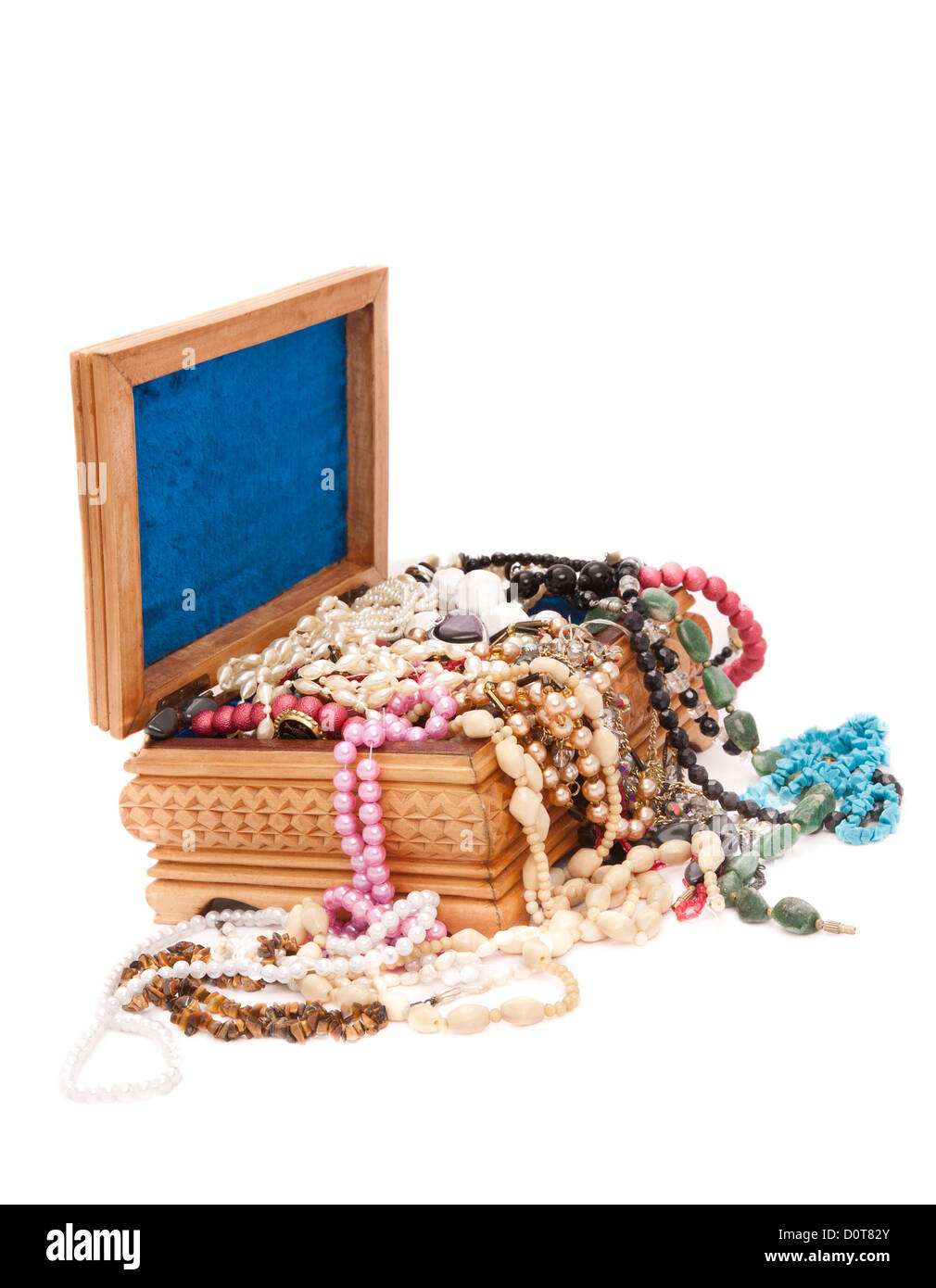 Wooden box full of jewelry on white background Stock Photo - Alamy