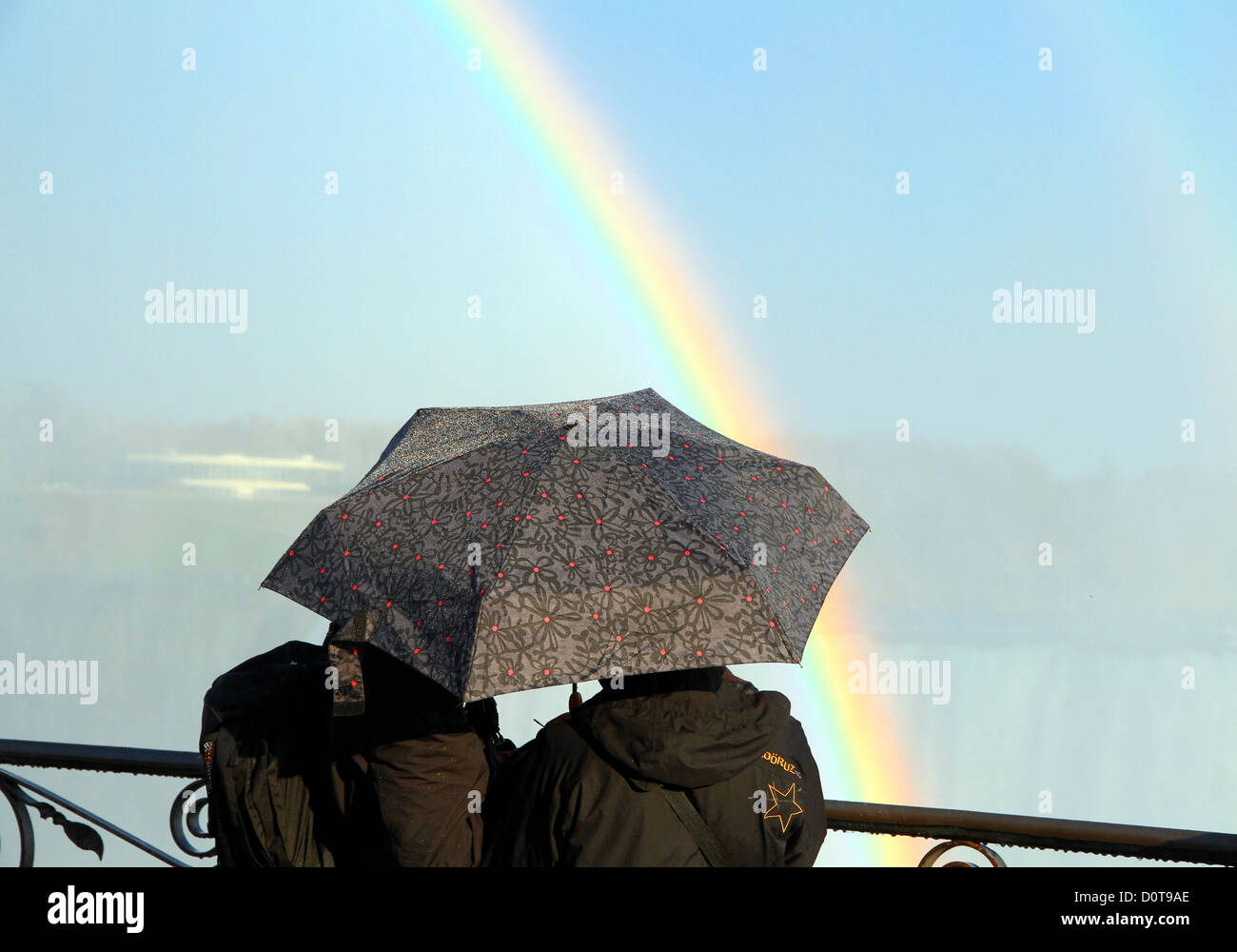 Couple and Rainbow Stock Photo - Alamy