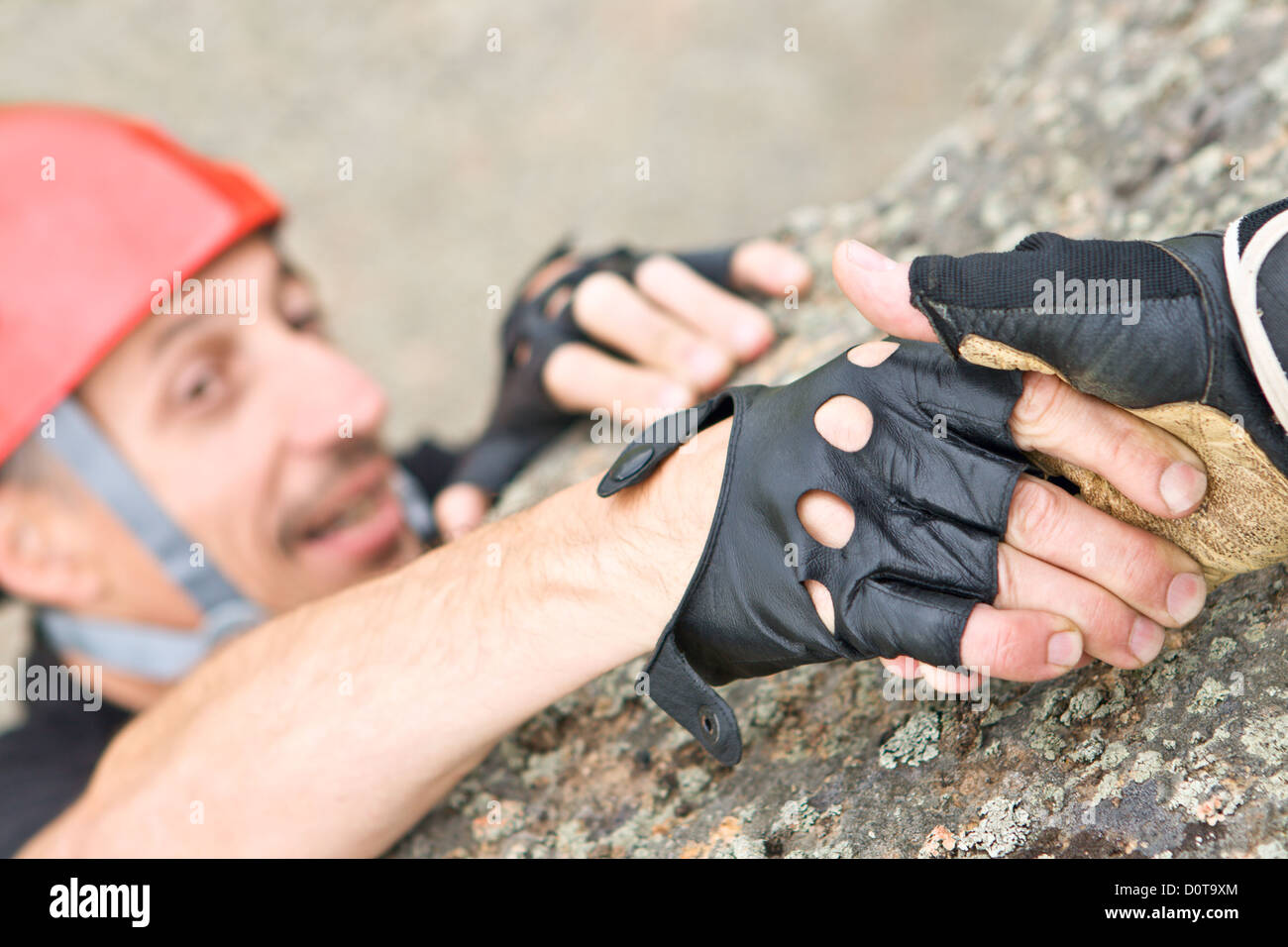 Rock climbers helping other hi-res stock photography and images - Alamy