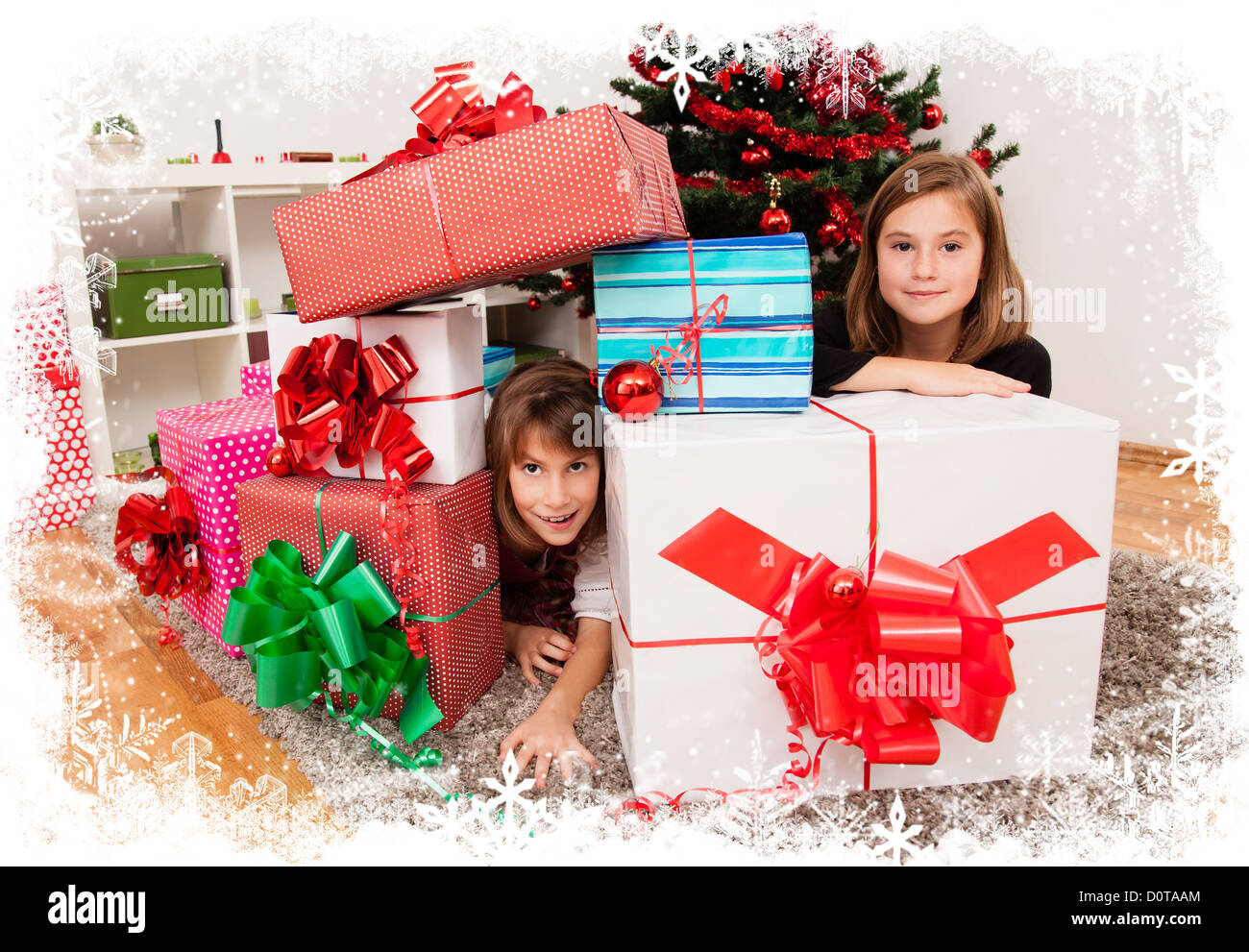 Kids with their christmas presents Stock Photo - Alamy