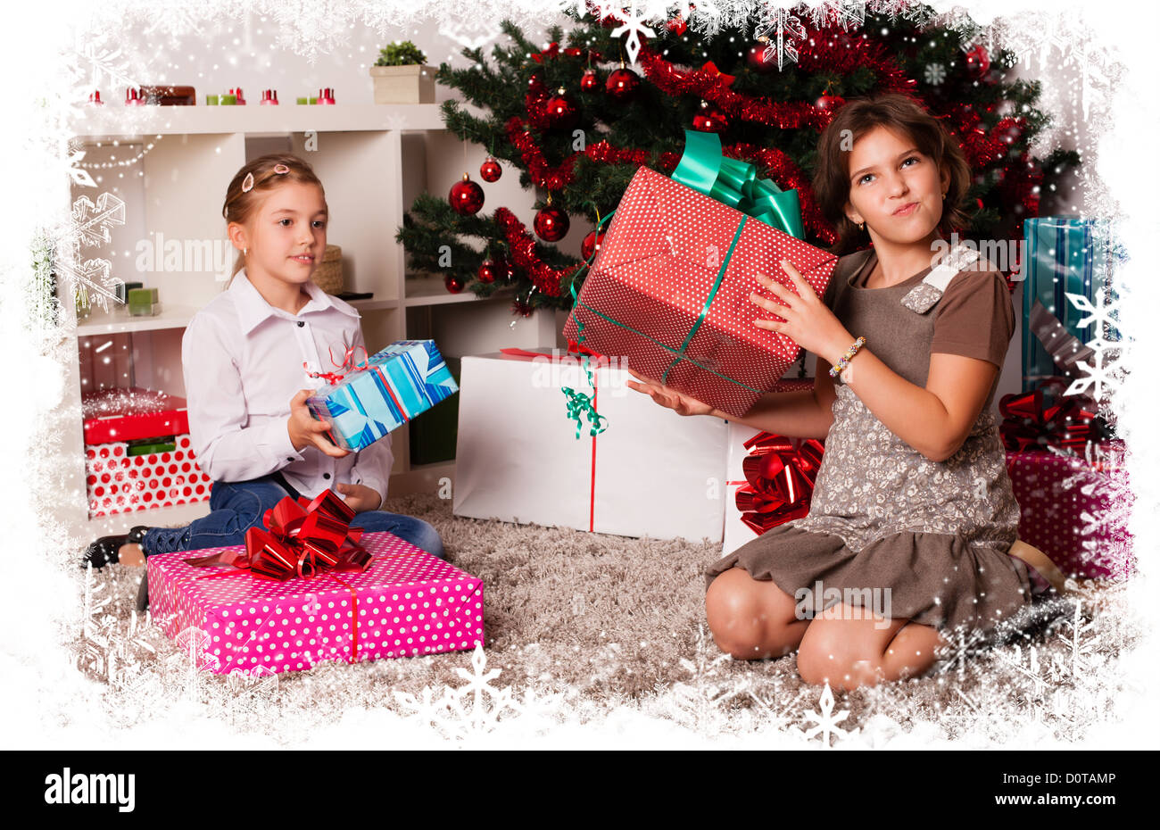 Kids with their christmas presents Stock Photo - Alamy