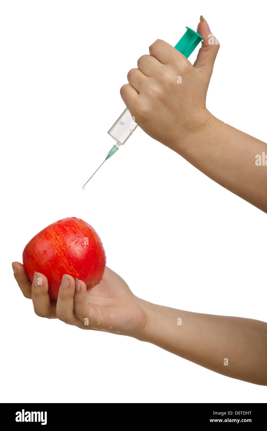 Experiment with apple and syringe on white Stock Photo - Alamy