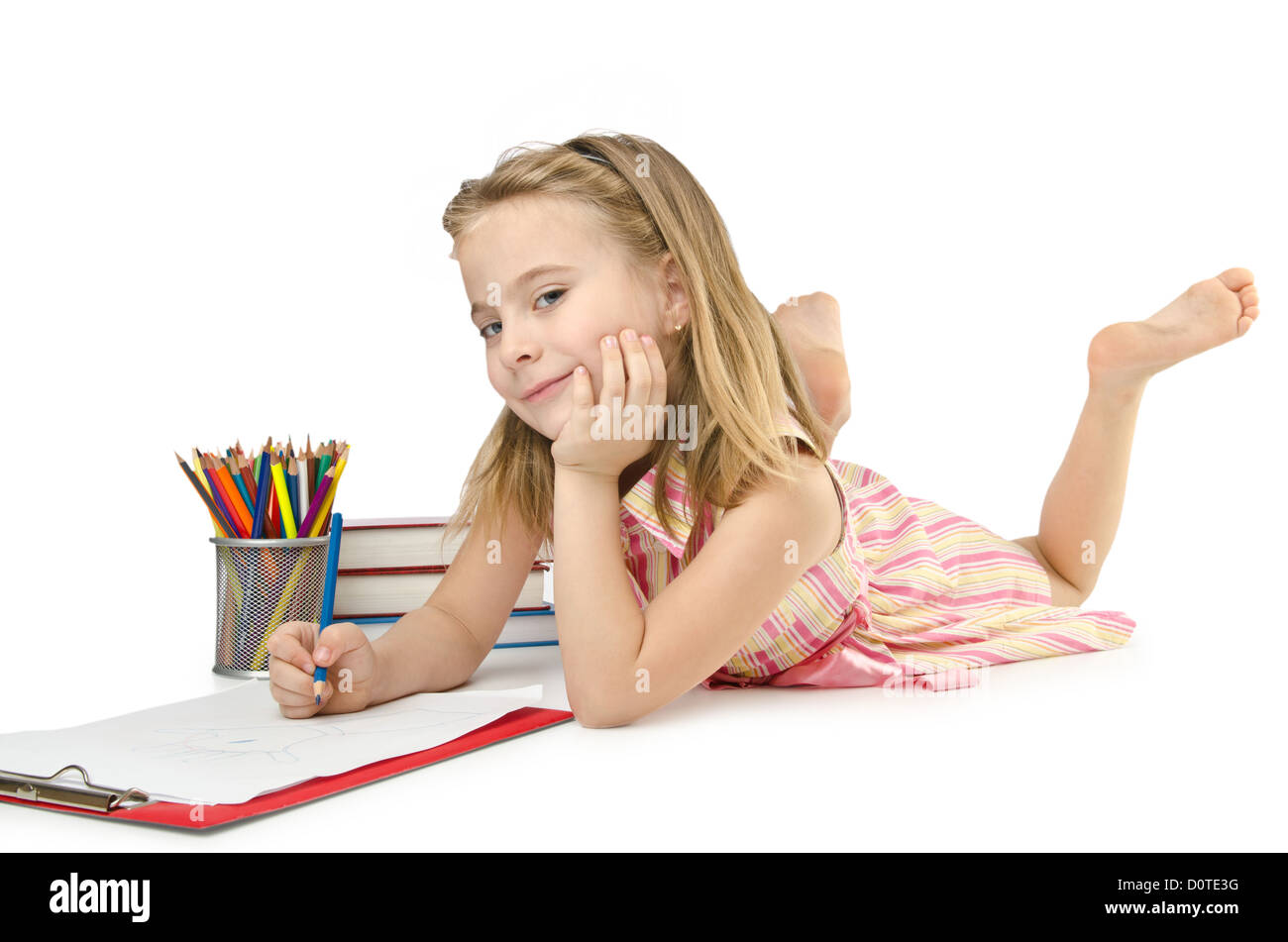 Little girl writing with pencils Stock Photo - Alamy