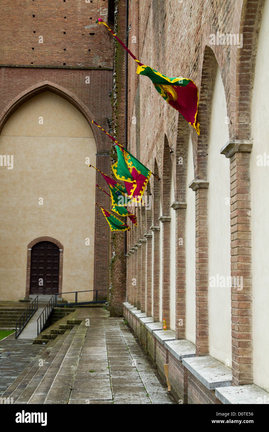 Facade with colorful Flags in Siena, Italy Stock Photo - Alamy