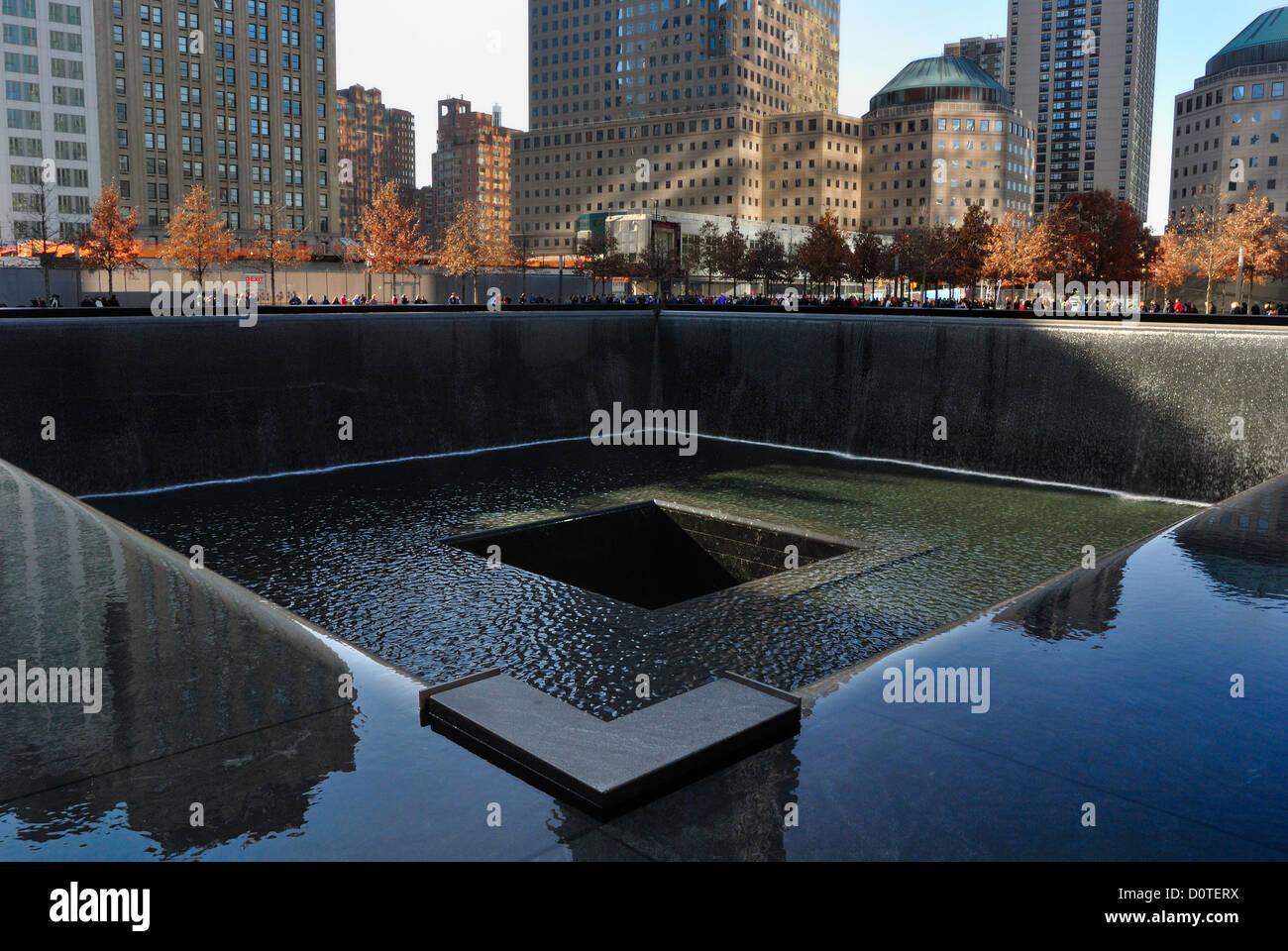 South reflecting pool and surrounding buildings, 9/11 Memorial, New ...