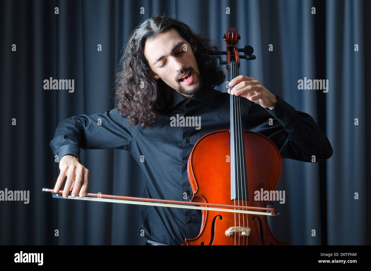 Man playing the cello Stock Photo - Alamy