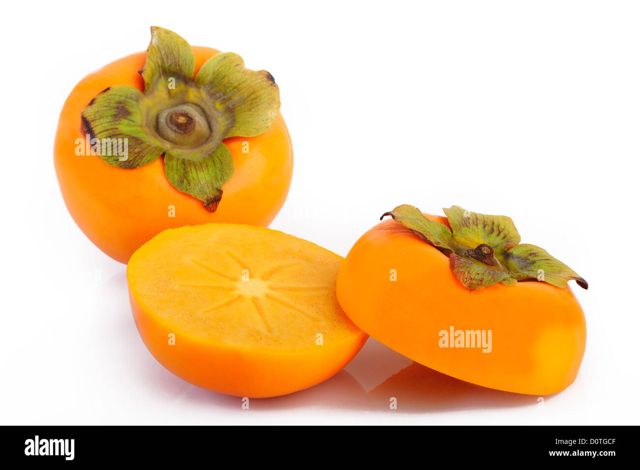 Persimmon fruit slice on white background Stock Photo - Alamy